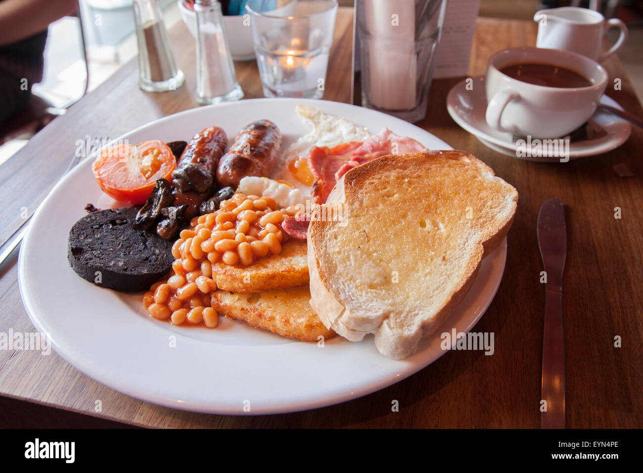 Typical English Breakfast Served with Tea Stock Photo - Alamy