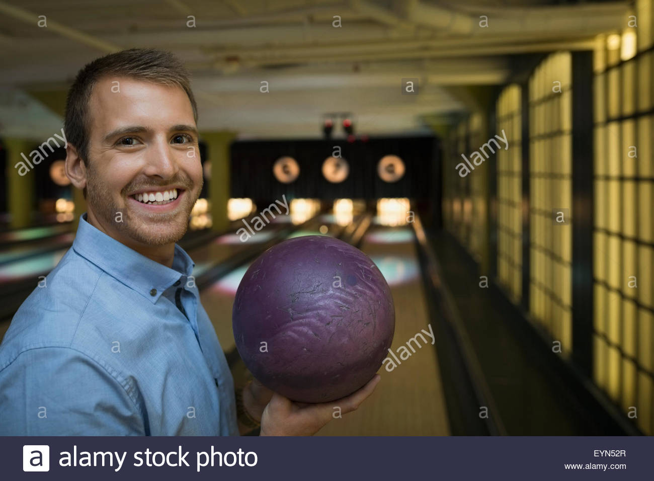 Man with bowling ball hi-res stock photography and images - Alamy
