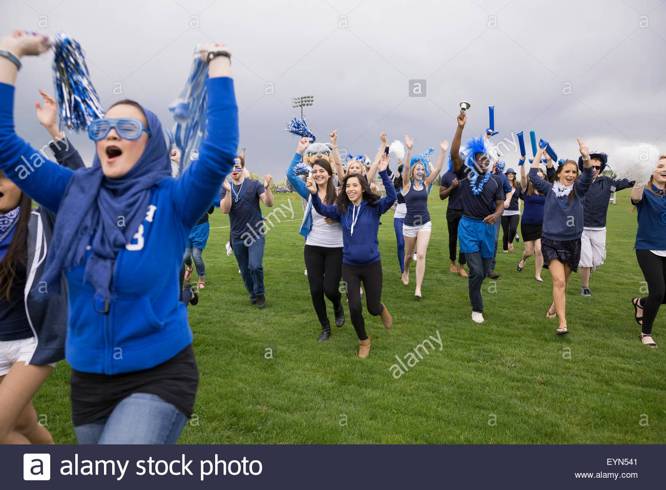 Celebrating in front of crowd hi-res stock photography and images - Alamy