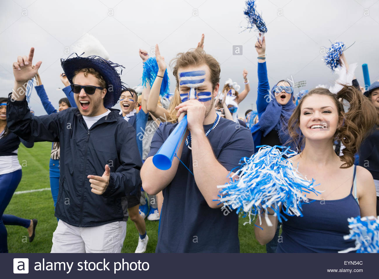 Celebrating in front of crowd hi-res stock photography and images - Alamy