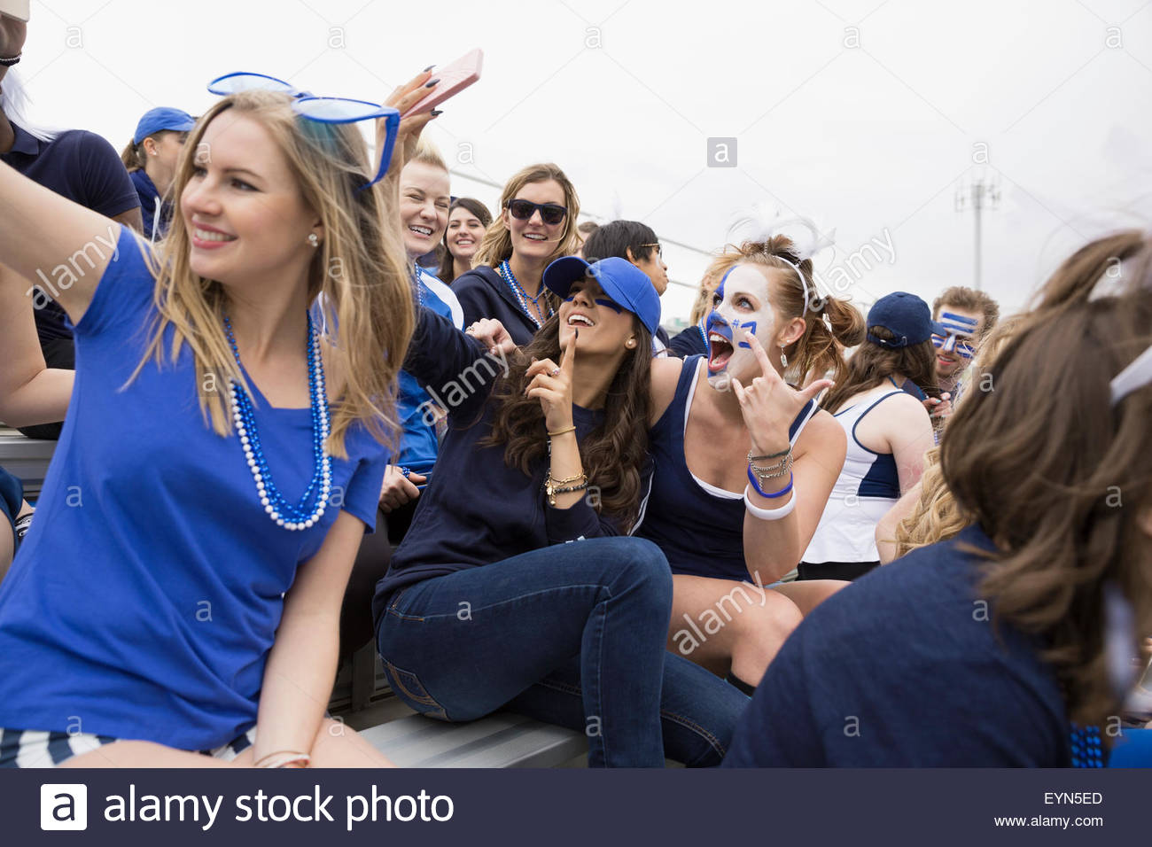 Posing fan hi-res stock photography and images - Alamy