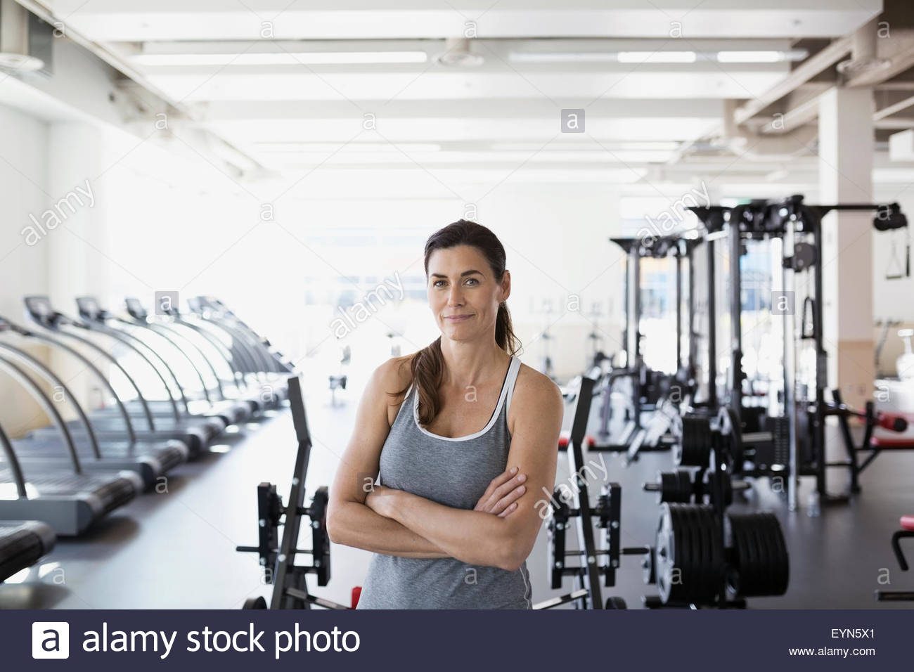 Portrait confident woman at gym Stock Photo - Alamy