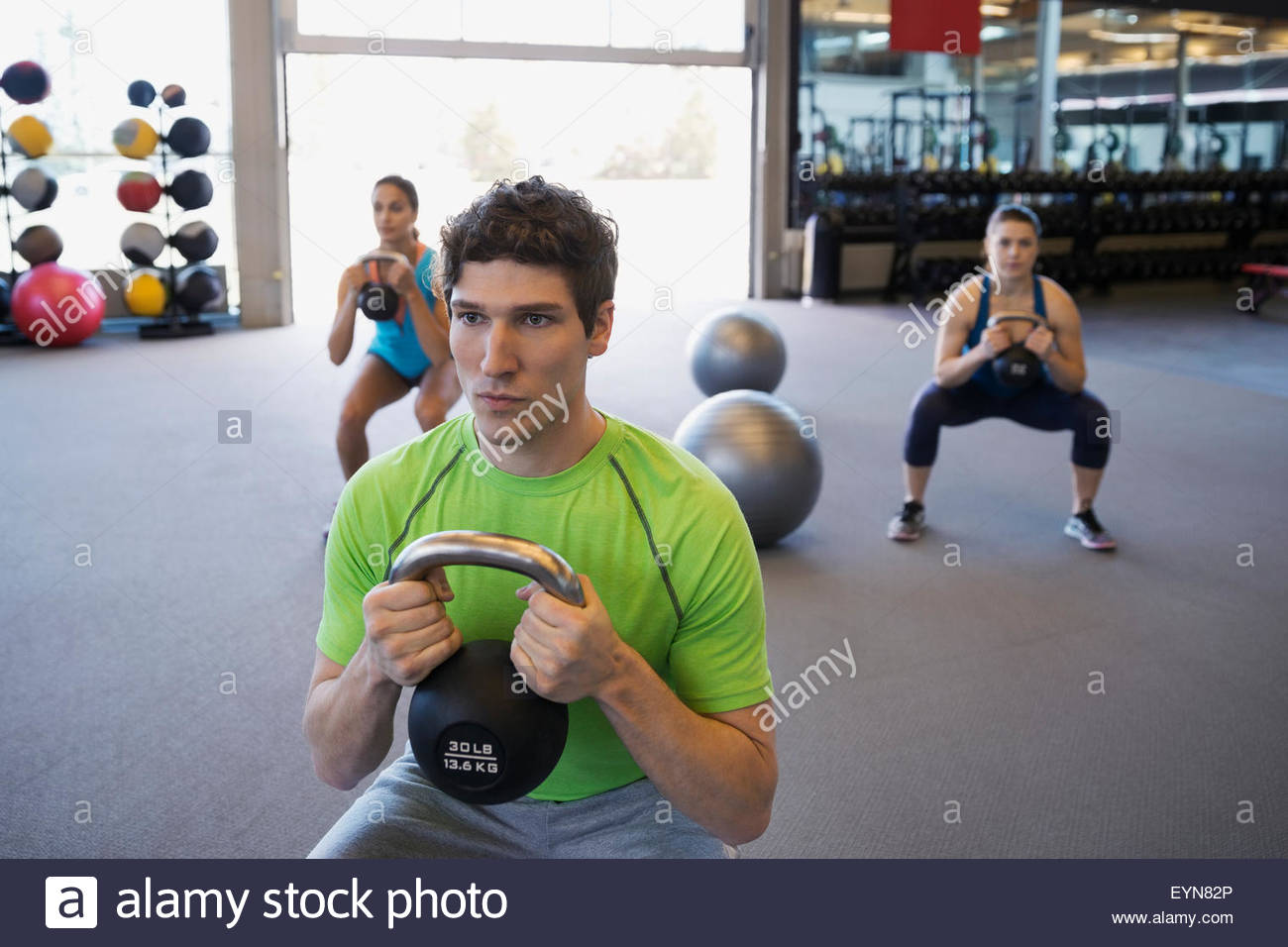Kettlebell squat hi-res stock photography and images - Alamy