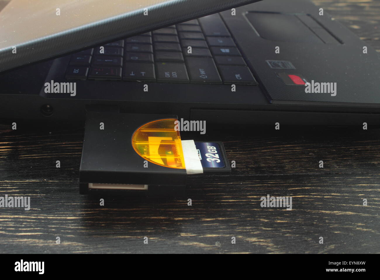 reader with a memory card inserted into a laptop Stock Photo - Alamy