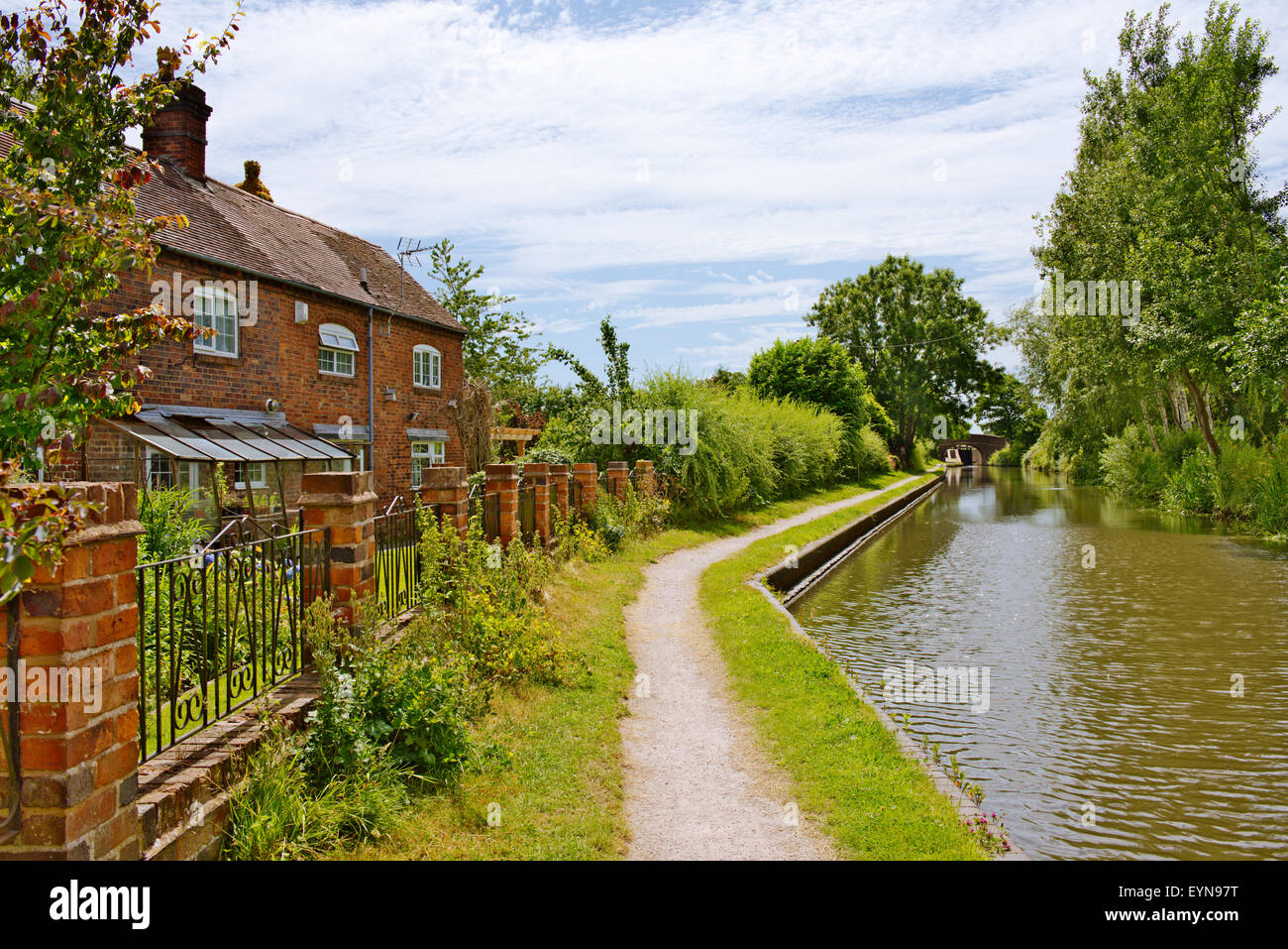 Old brick cottages along Birmingham and Fazeley Canal near lock 6 ...