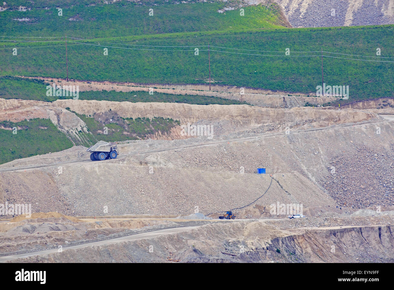 Haul trucks taking waste material to dump site, Highland Valley copper ...
