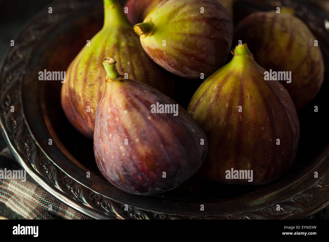 Raw Organic Brown Figs in a Bowl Stock Photo - Alamy