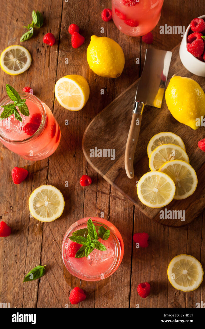 Refreshing Cold Raspberry Lemonade with a Mint Garnish Stock Photo - Alamy