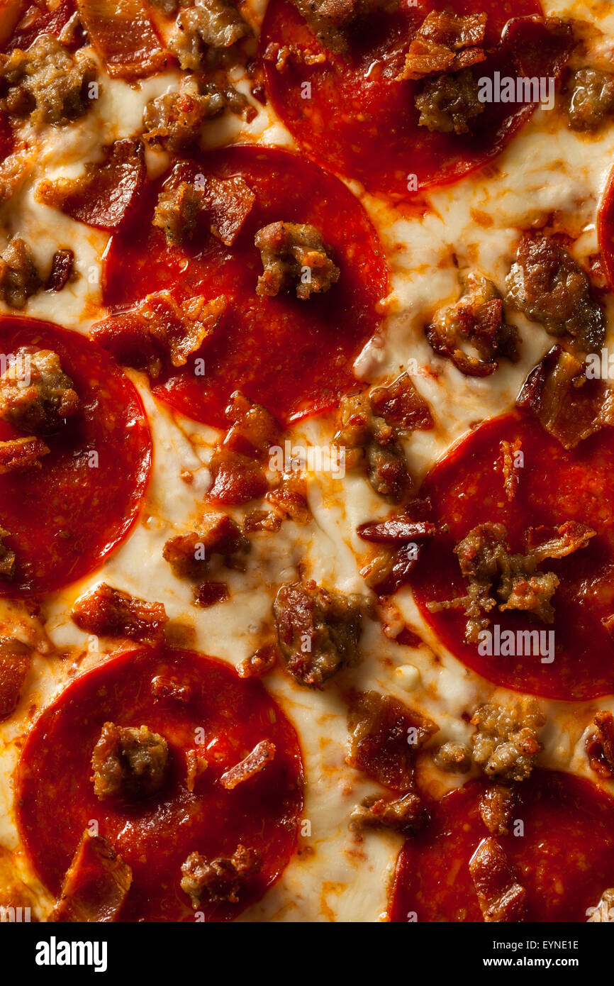Homemade Meat Loves Pizza with Pepperoni Sausage and Bacon Stock Photo ...