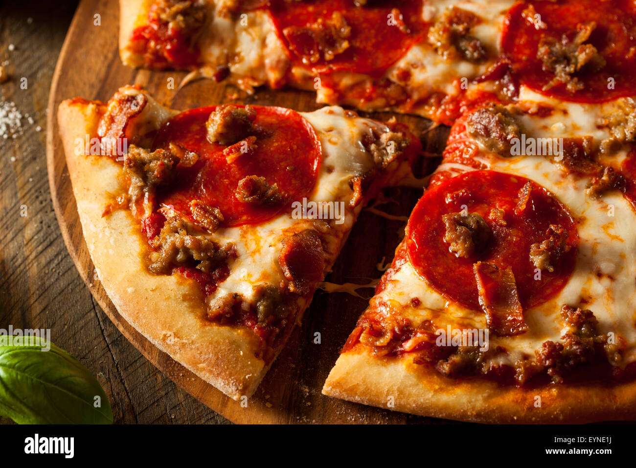 Homemade Meat Loves Pizza with Pepperoni Sausage and Bacon Stock Photo ...