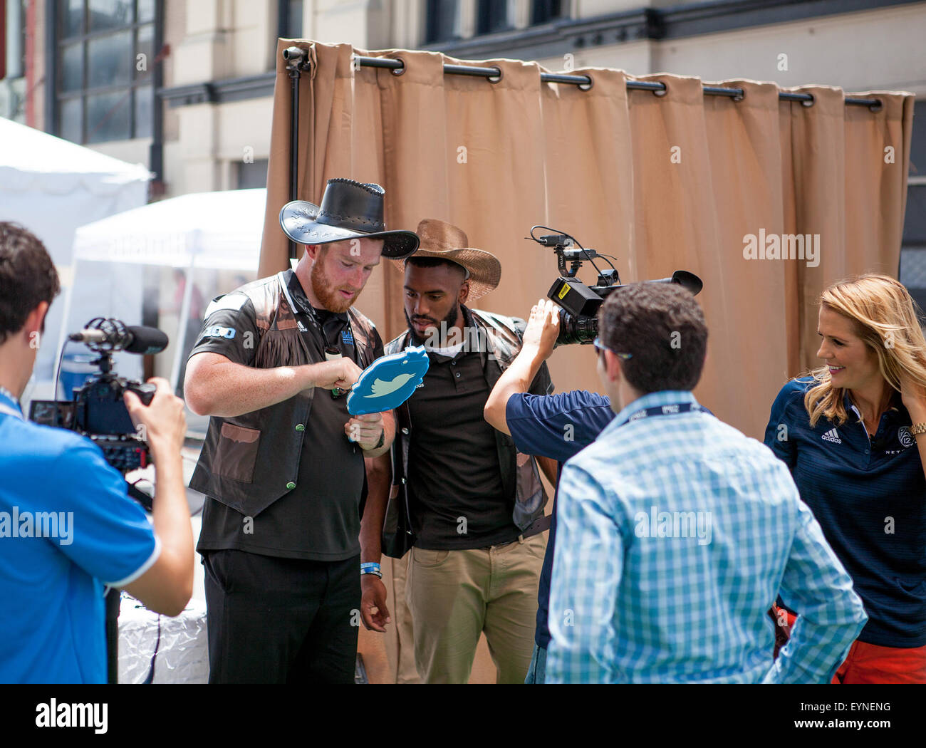 Burbank, CA. 30th July, 2015. UCLA Bruins linebacker Deon Hollins and ...