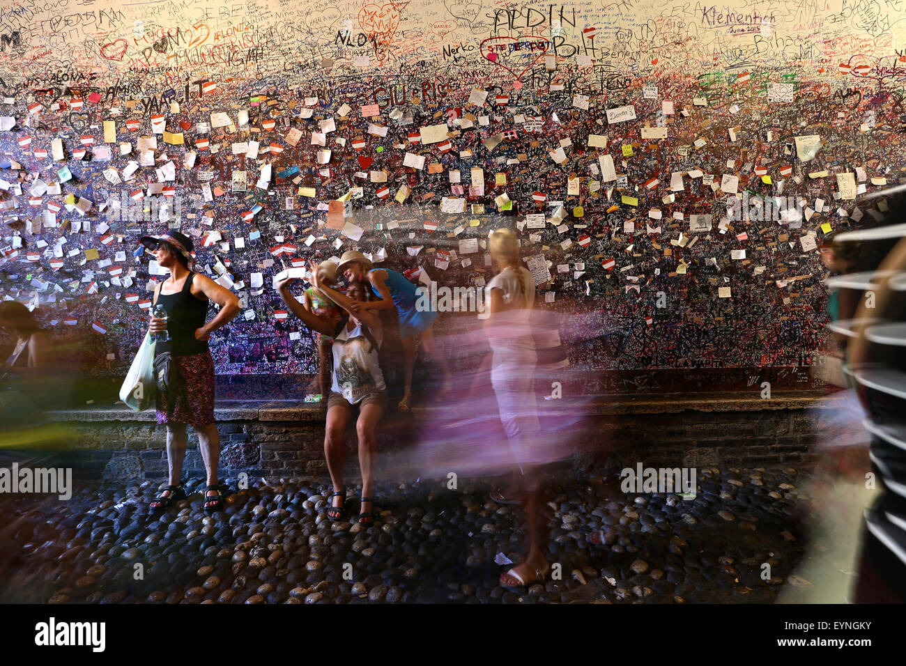 Beijing, China. 27th July, 2015. People visit the graffiti wall of ...