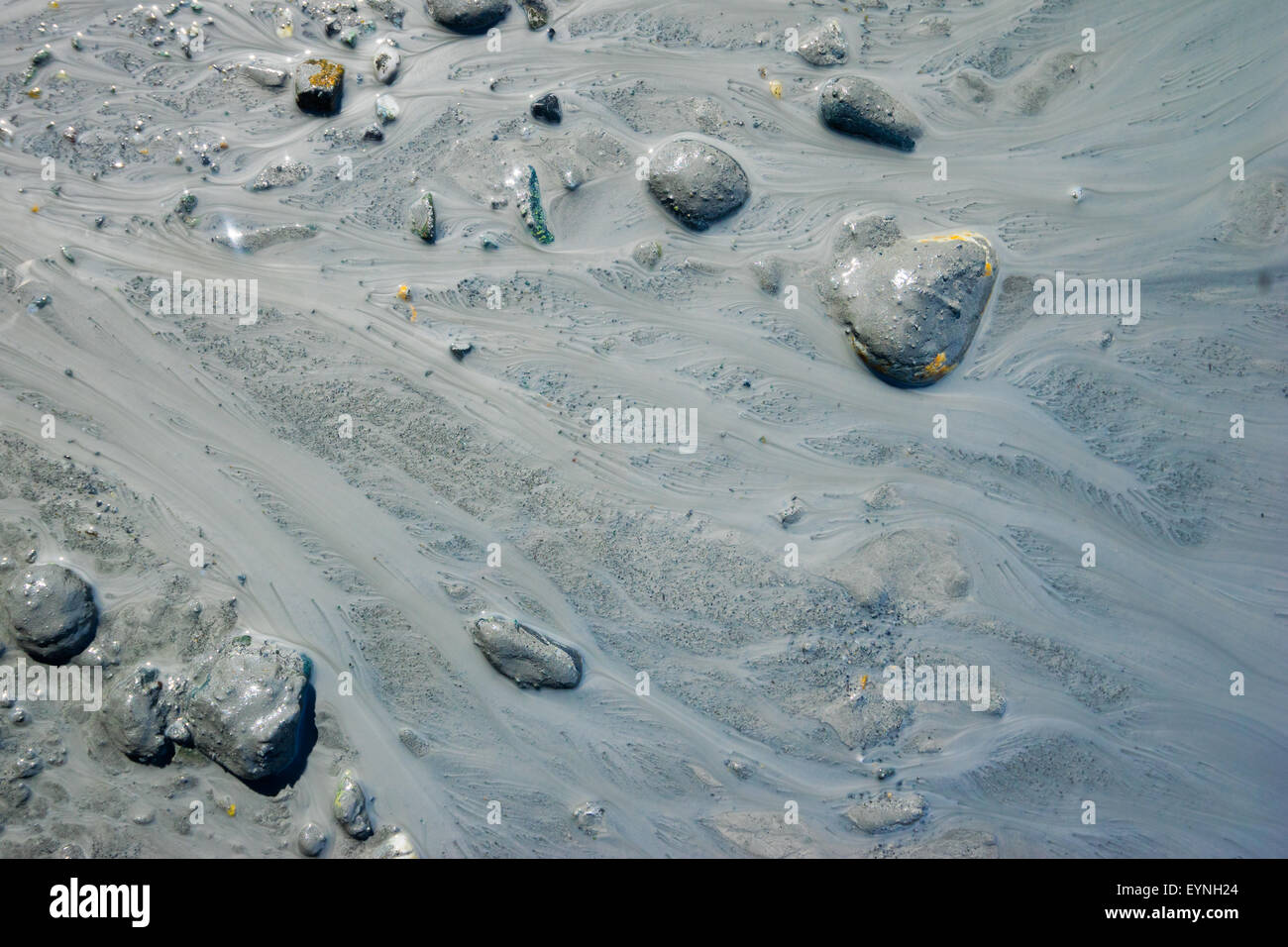 Pattern and design of mud and silt flow in stream Stock Photo - Alamy