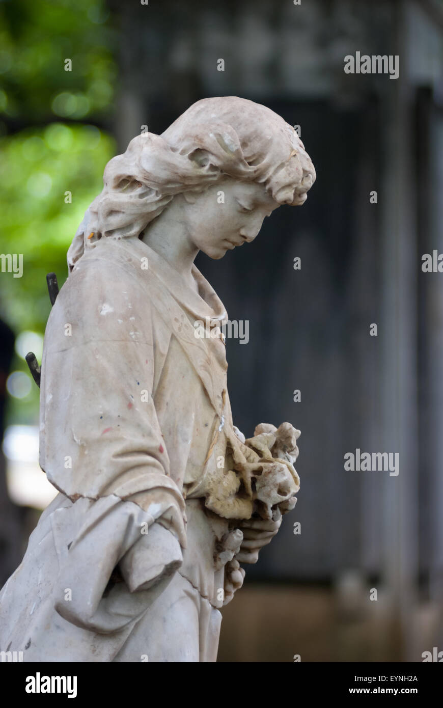 Statue of a mourning woman figure at Taman Prasati museum (museum of ...