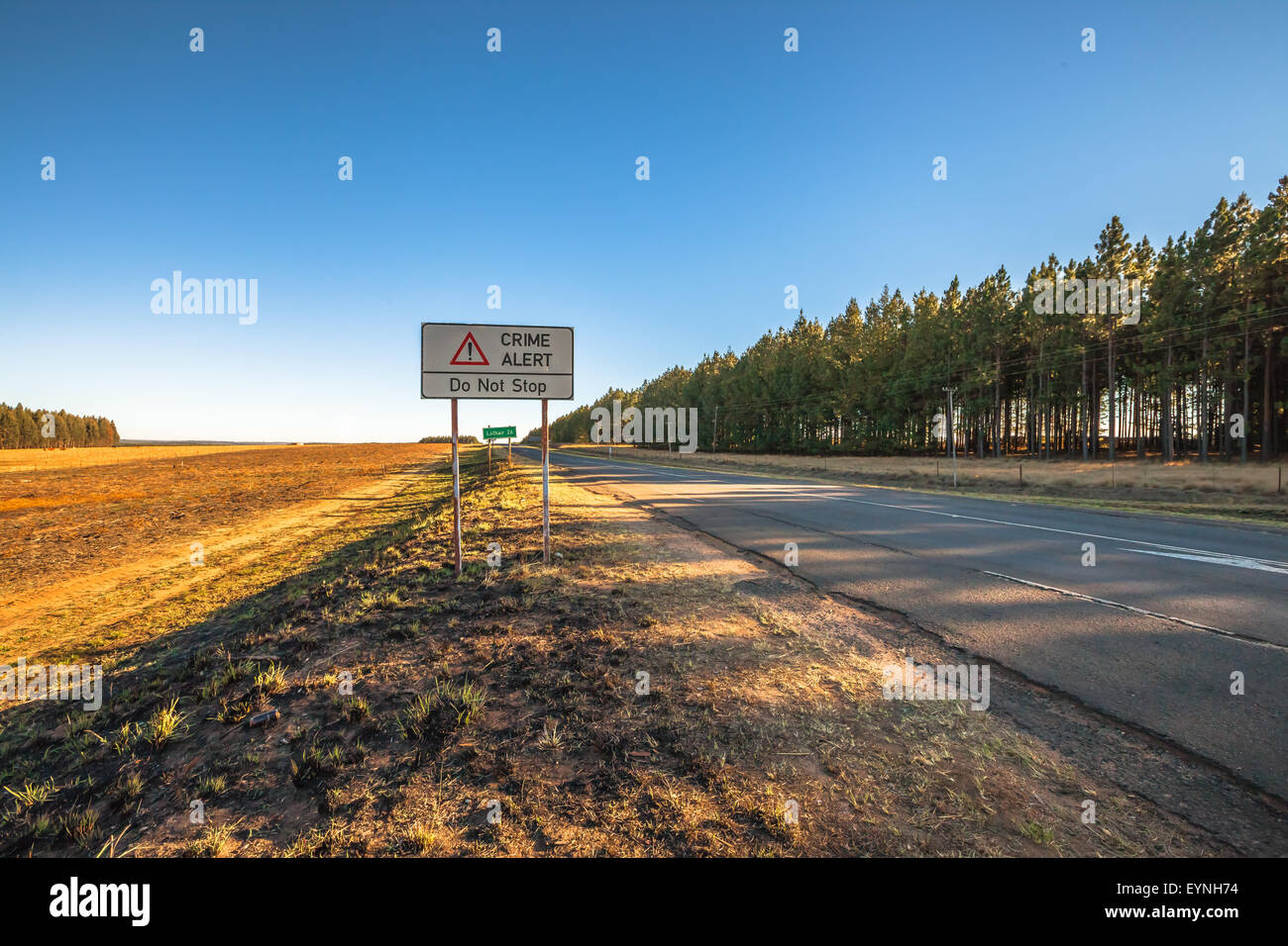Crime alert sign Stock Photo - Alamy