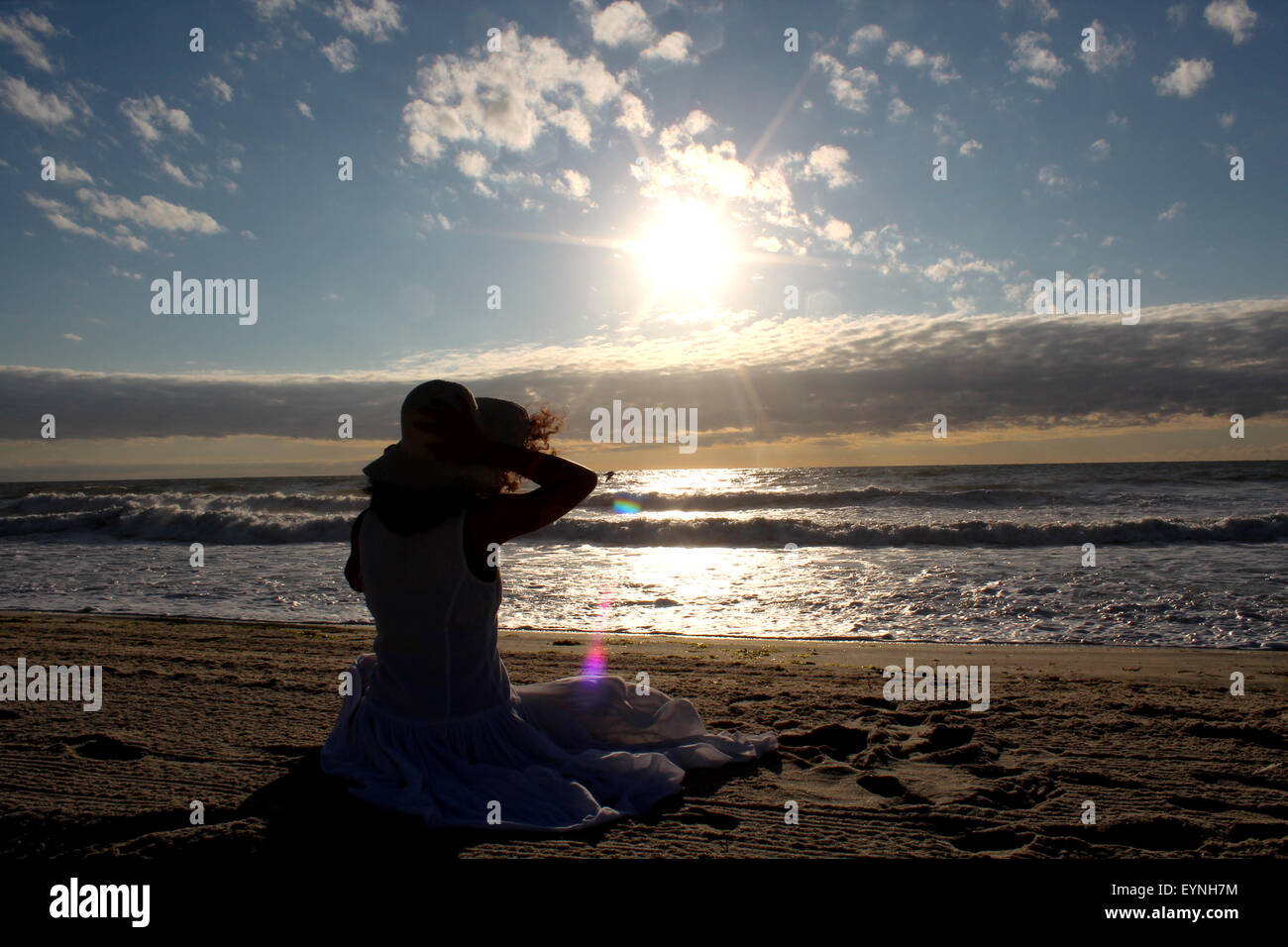 Woman and sunlight hi-res stock photography and images - Alamy