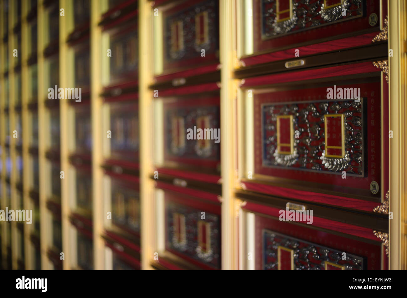 Rows of chinese memorial face plate Stock Photo - Alamy