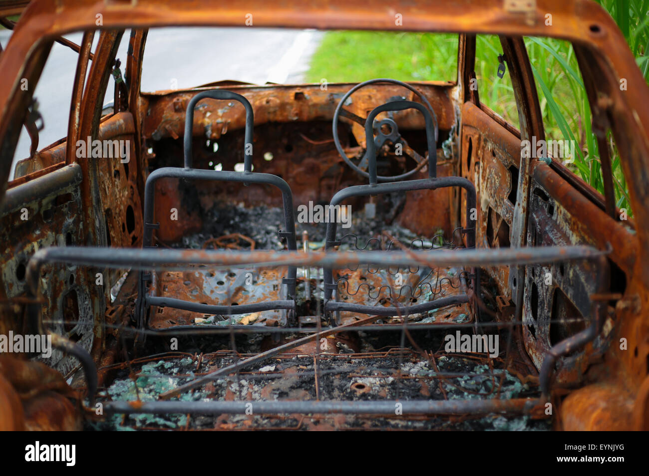 Burned down car interior Stock Photo - Alamy