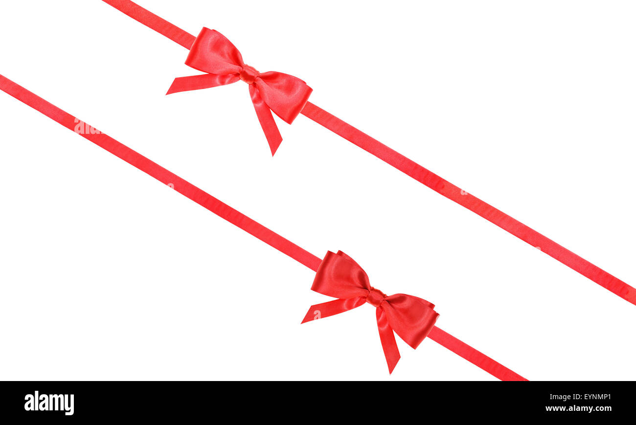 two red satin bows and two diagonal ribbons isolated on horizontal ...