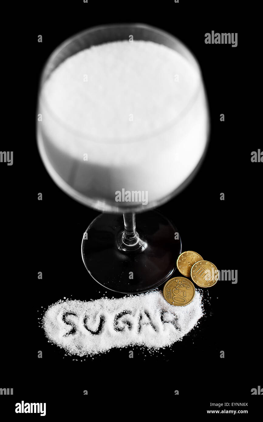 A cup of sugar and its cost Stock Photo - Alamy