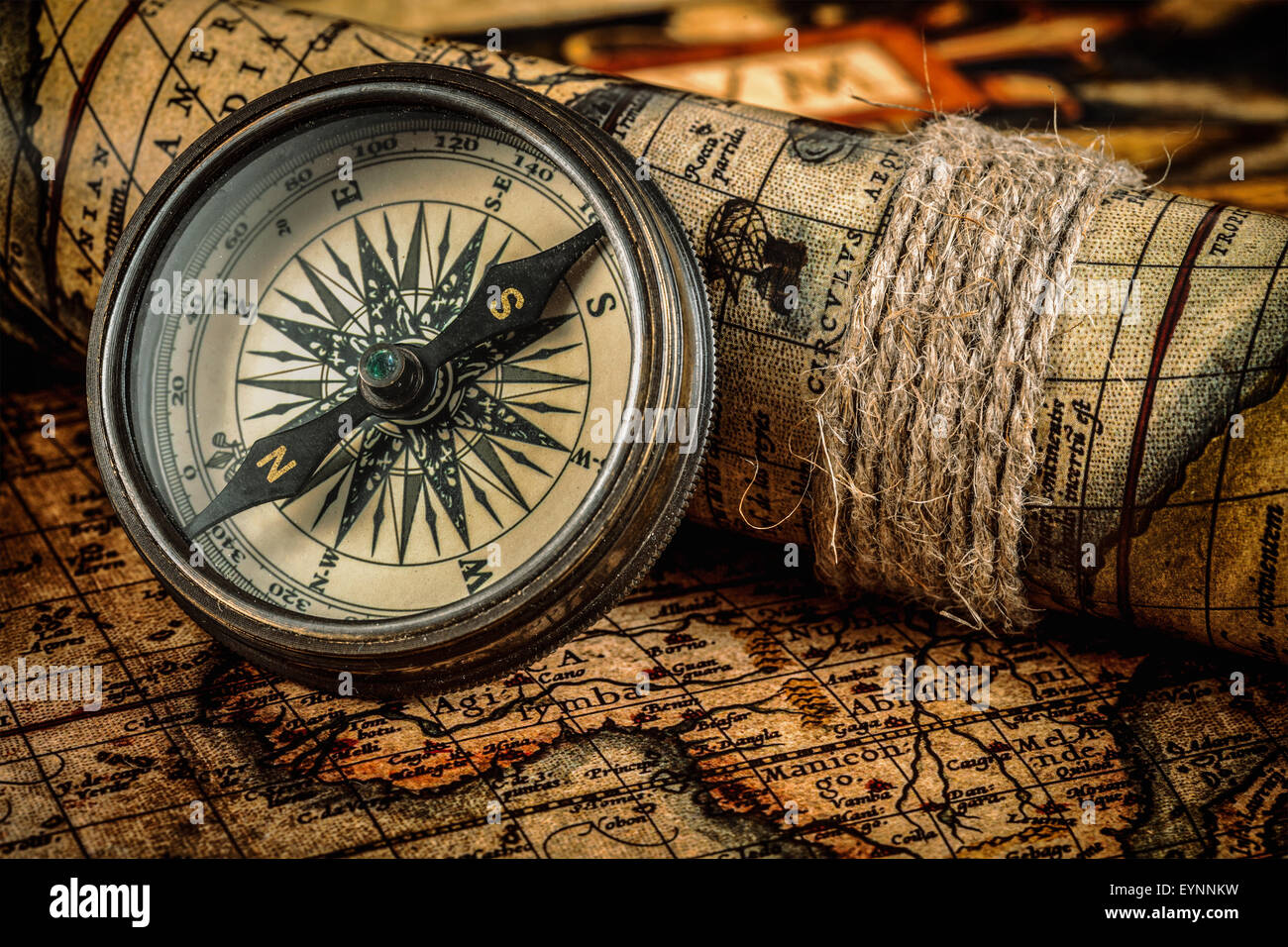 Old vintage compass on ancient map Stock Photo - Alamy