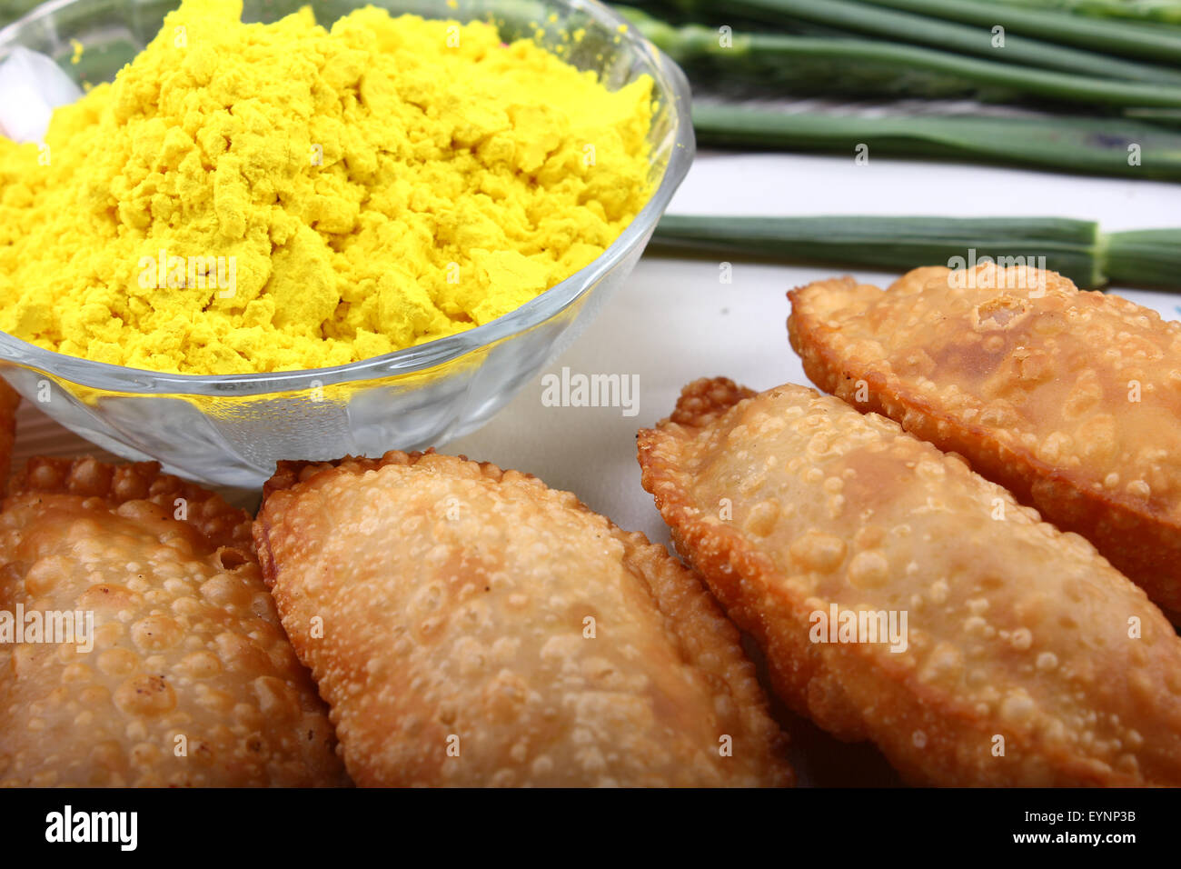 gujia, indian traditional snacks for holi festival with green color in ...