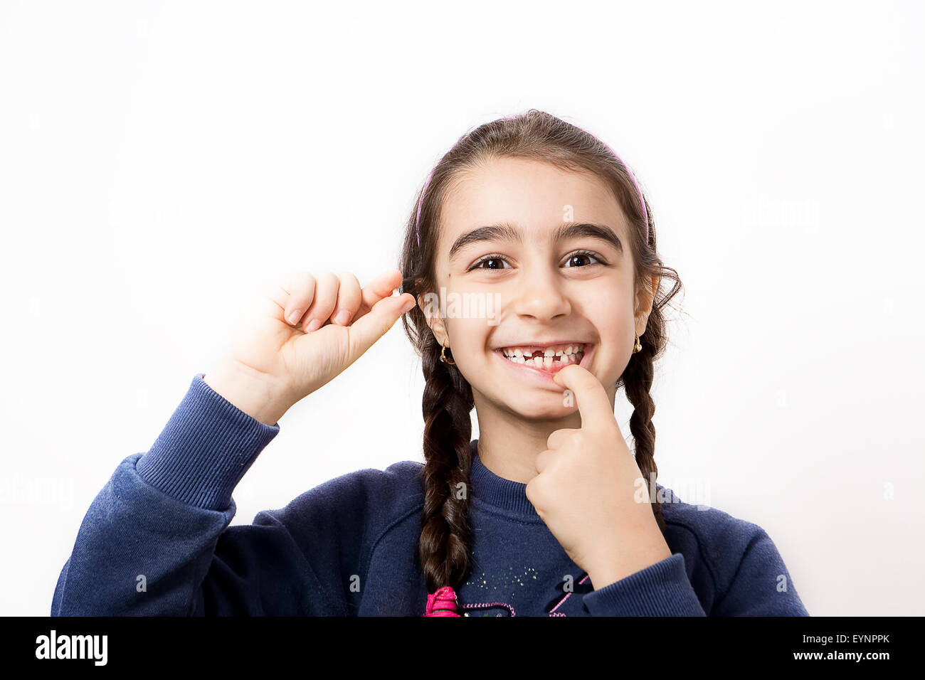 The fall of the first baby teeth Stock Photo - Alamy