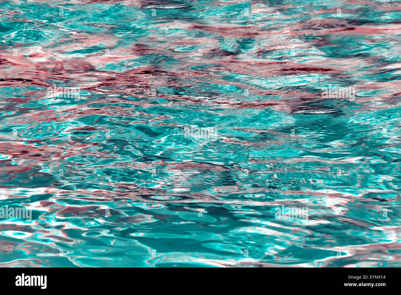 The surface of the water in the pool, sparkling with beautiful colored ...