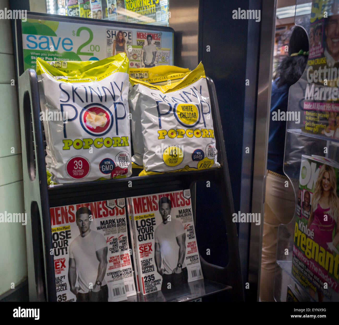 Packages of of SkinnyPop popcorn on a shelf in a convenience store in ...