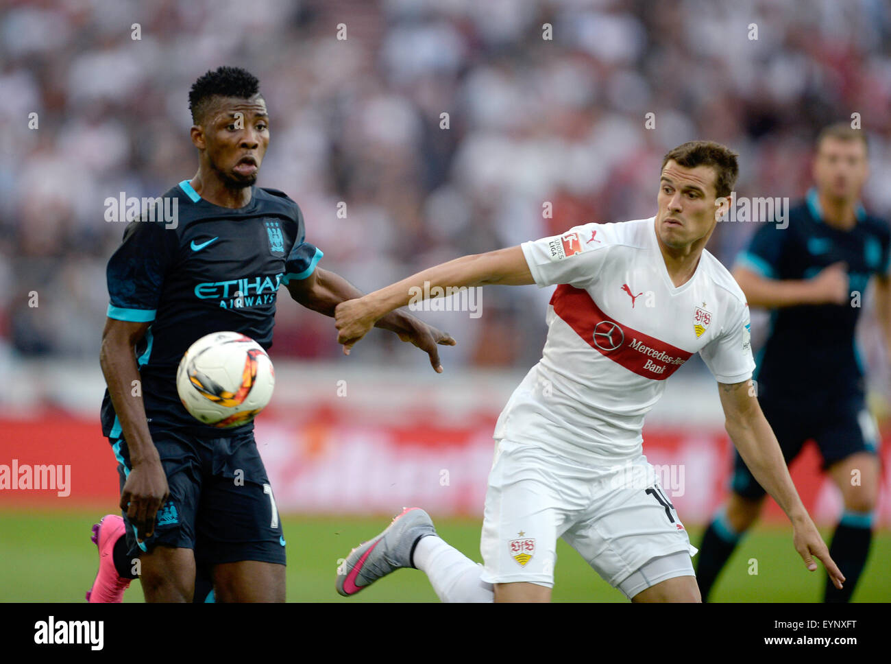 Stuttgart, Germany. 01st Aug, 2015. Stuttgart's Philip Heise (R) and ...