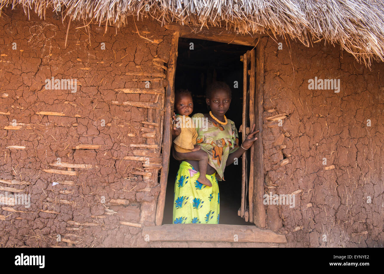 Berta girl with baby in a hut, near Asossa, Ethiopia Stock Photo - Alamy