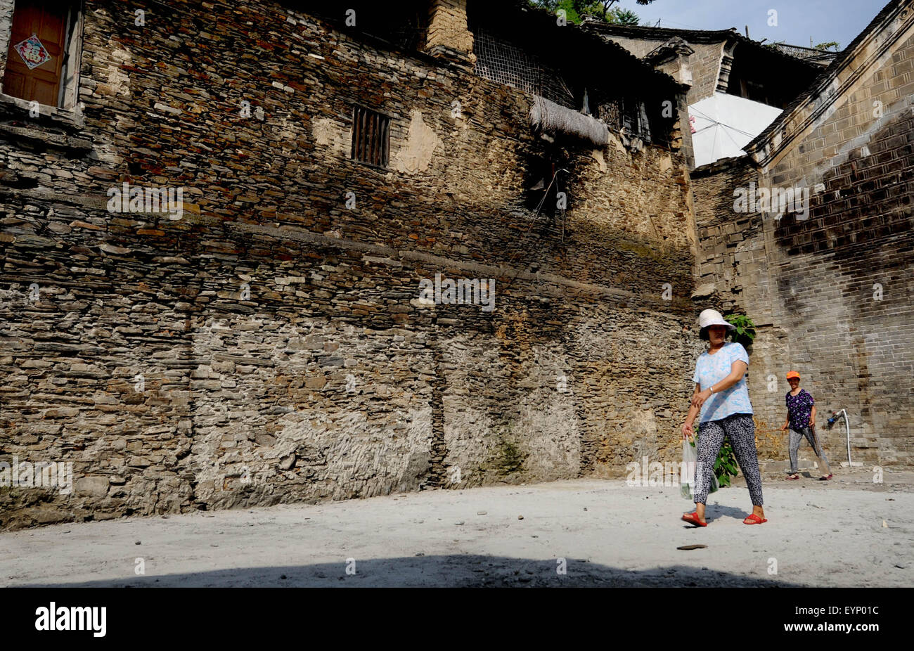 Ankang, China's Shaanxi Province. 2nd Aug, 2015. A tourist walks by an ...