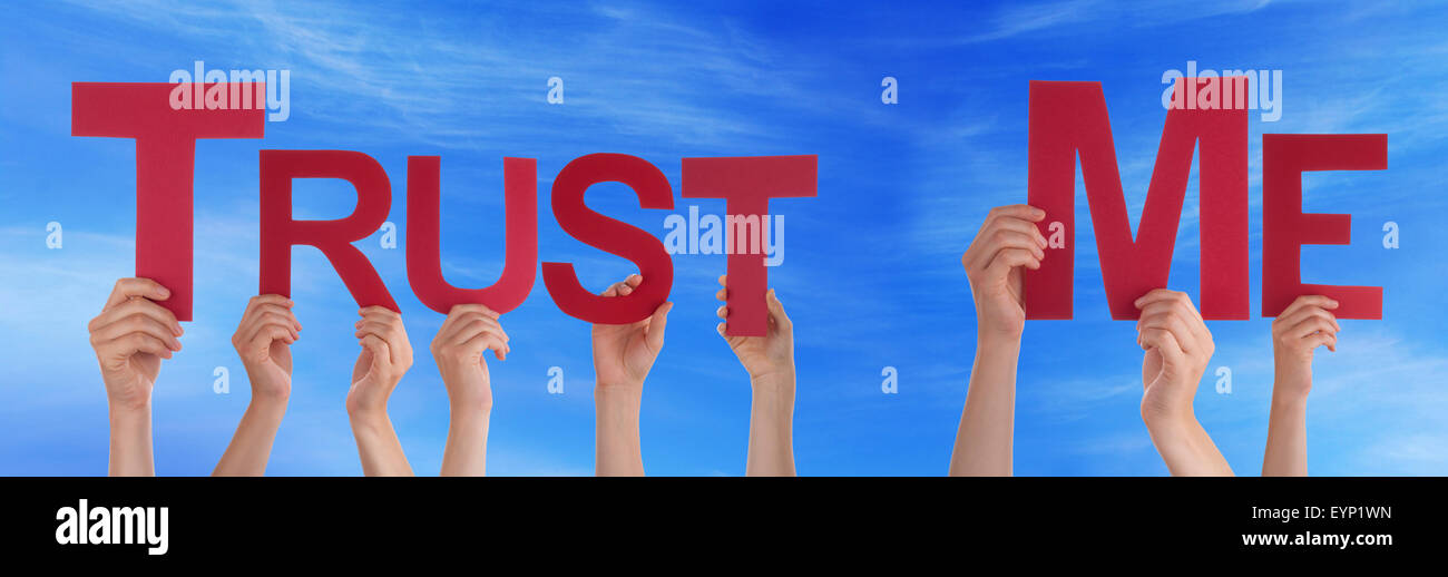 People Hands Holding Red Straight Word Trust Me Blue Sky Stock Photo ...