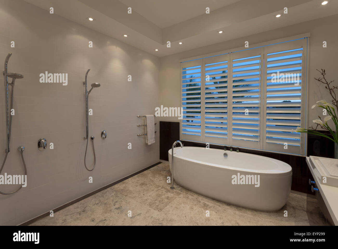 Minimalistic white coloured shower room in a luxurious house Stock ...