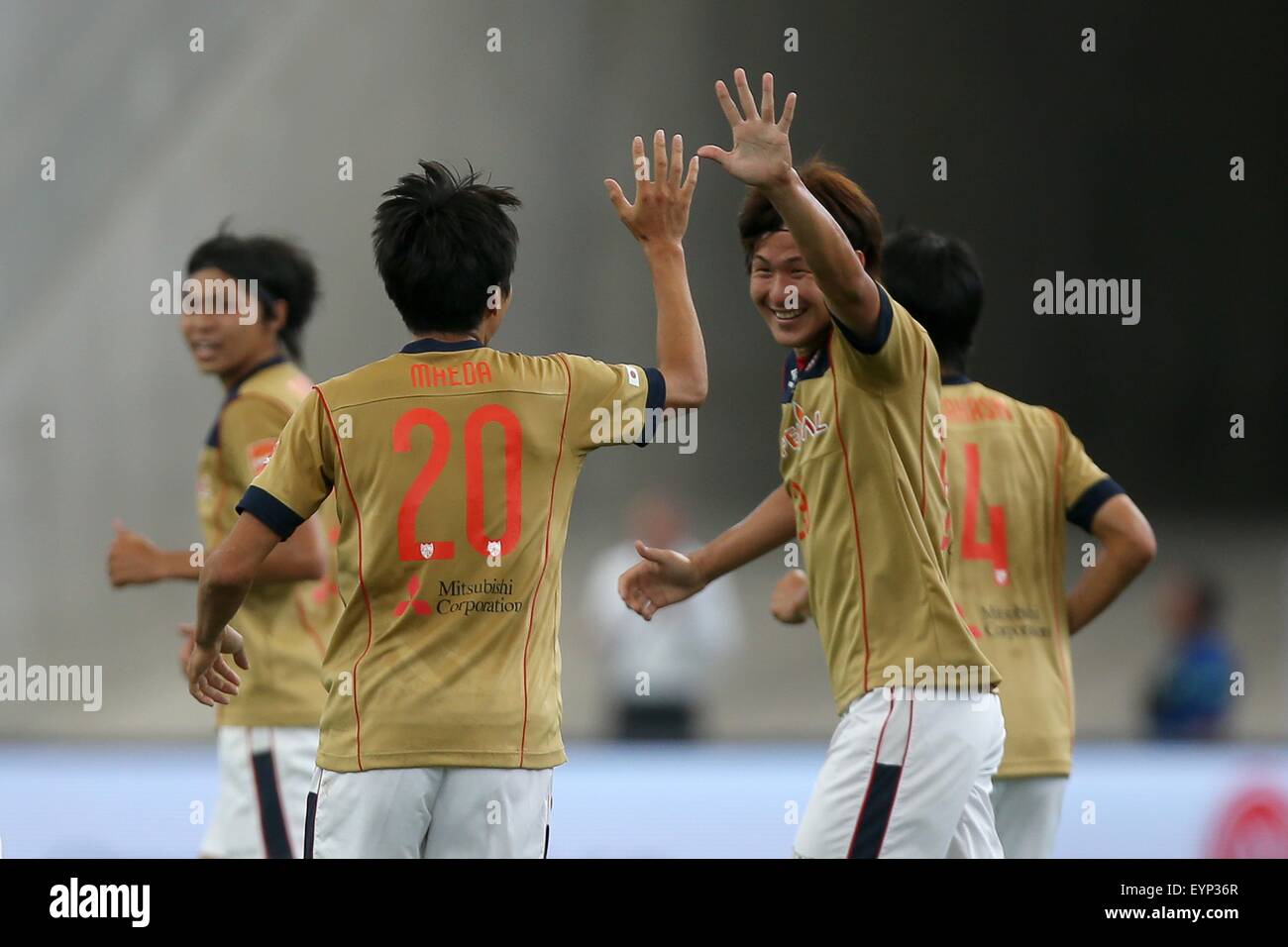 Tokyo's Ryoichi Maeda (L) and Kento Hashimoto celebrate the 0-1 goal ...