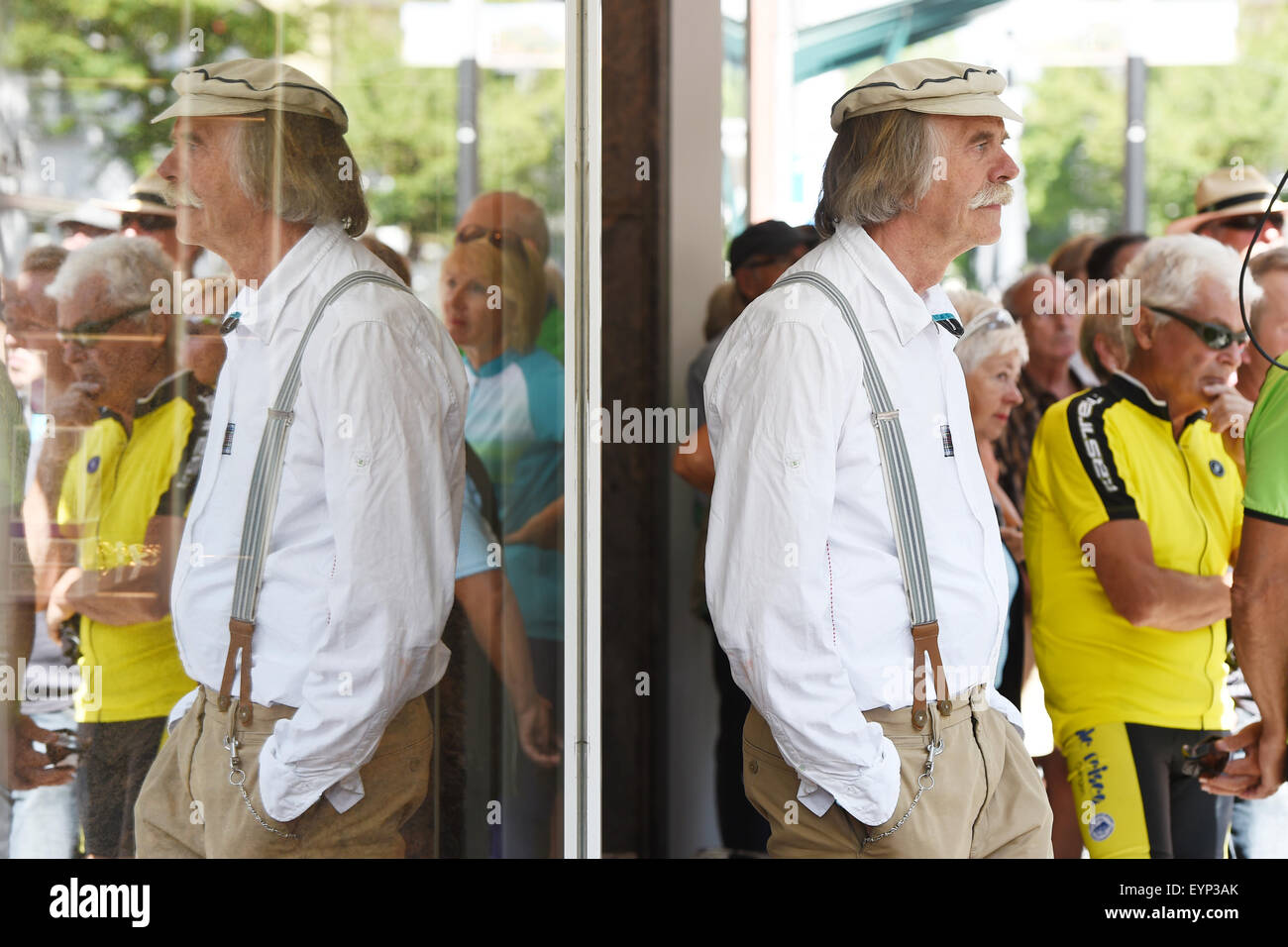 Artist Peter Lenk watches the unveiling of his new sculpture entitled ...