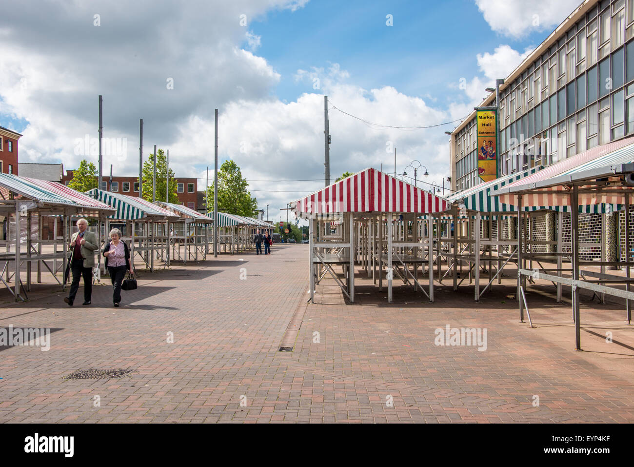 A couple walking through deserted market in Wolverhampton West Midlands ...