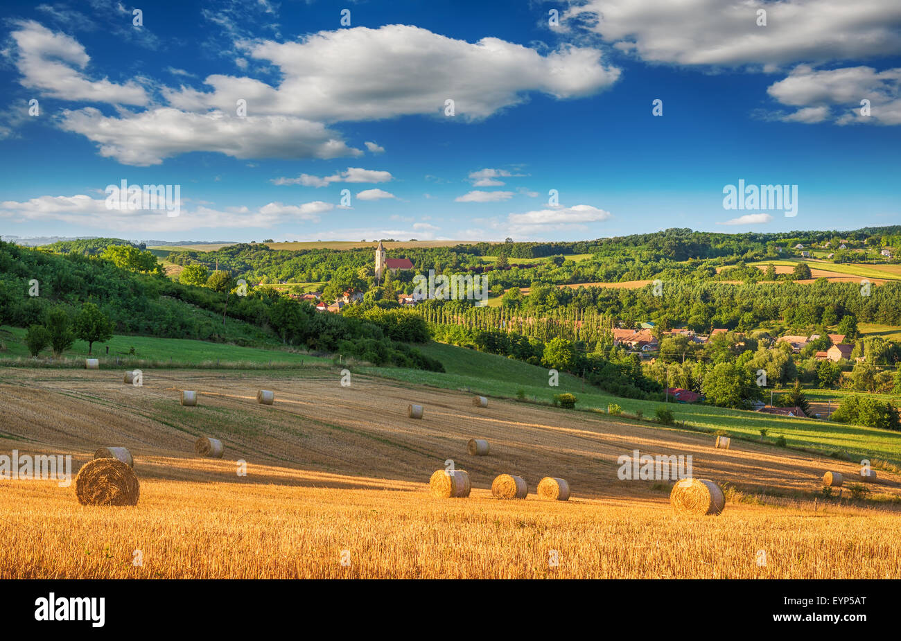 Hay, line of sight of the village Stock Photo - Alamy