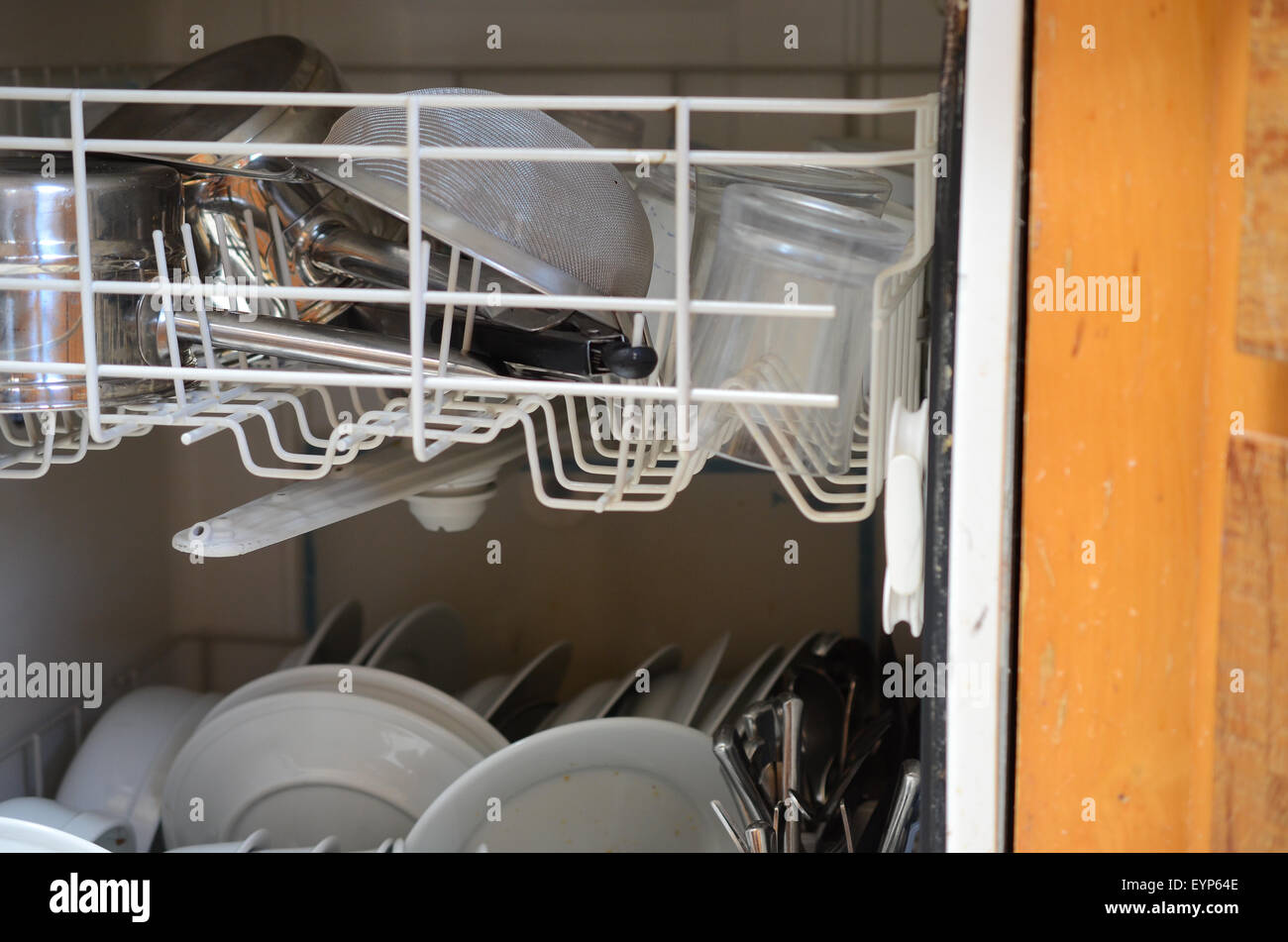 A full dishwasher Stock Photo - Alamy