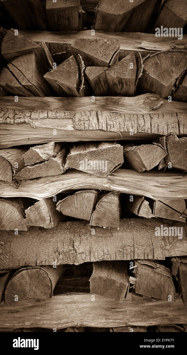 Neatly stacked wood as background, vertical Stock Photo - Alamy