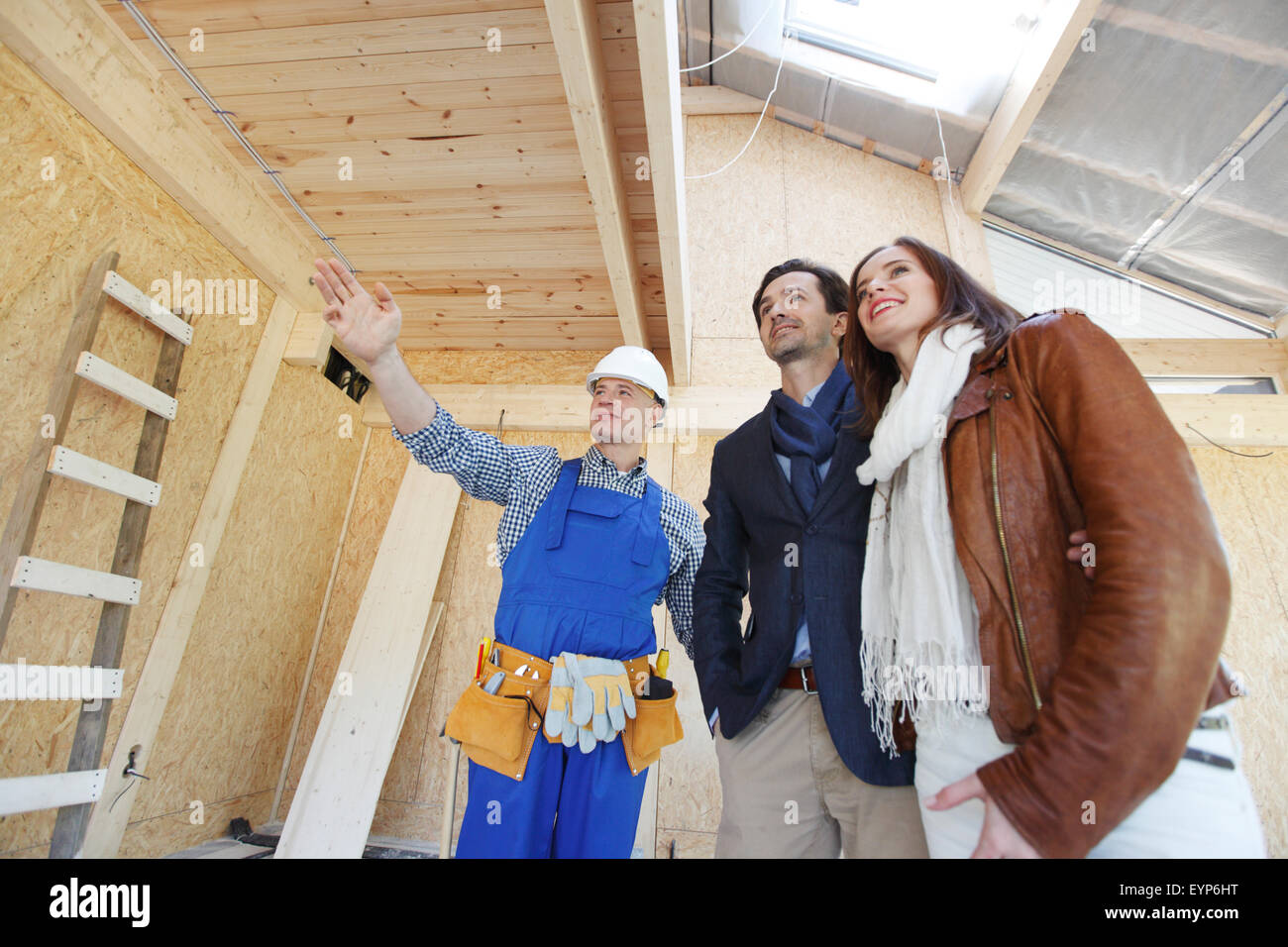 foreman shows new house Stock Photo - Alamy