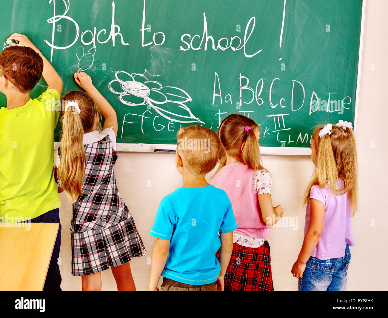 Children writing on blackboard Stock Photo - Alamy Children writing on blackboard Stock Photo - Alamy