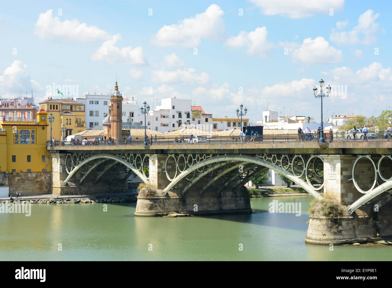 The Isabel II bridge or the Triana Bridge over the Guadalquivir River ...