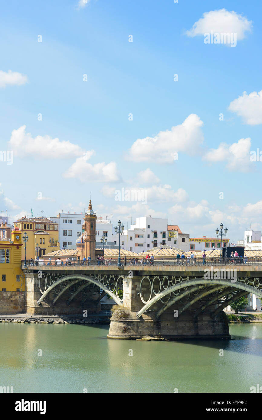 The Isabel II bridge or the Triana Bridge over the Guadalquivir River ...