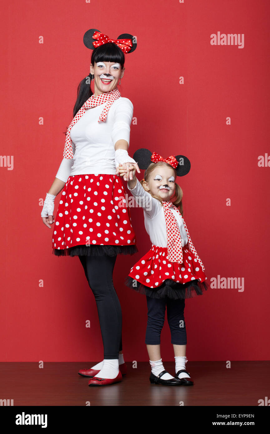 two girls with mouse masks Stock Photo - Alamy