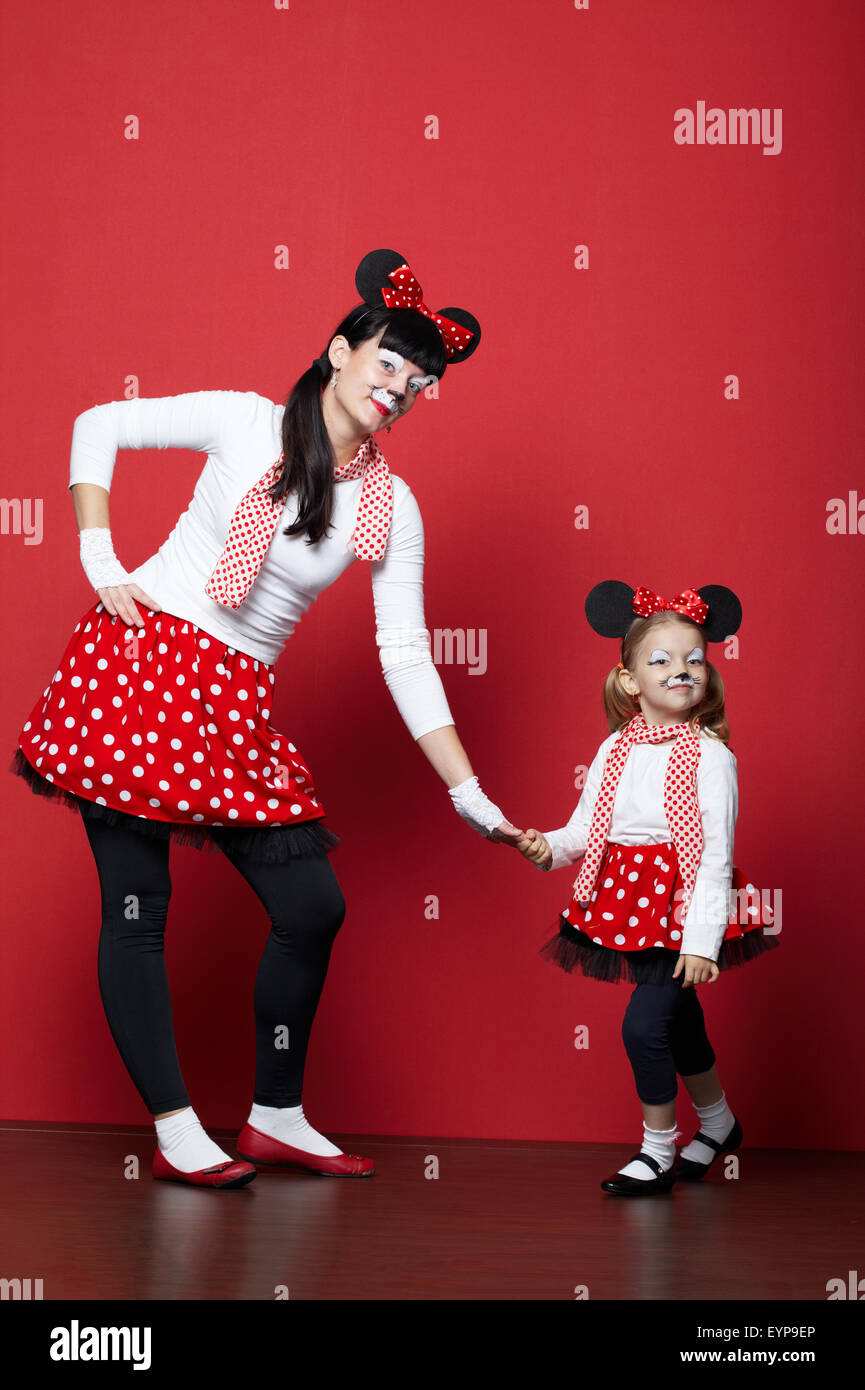 two girls with mouse masks Stock Photo - Alamy