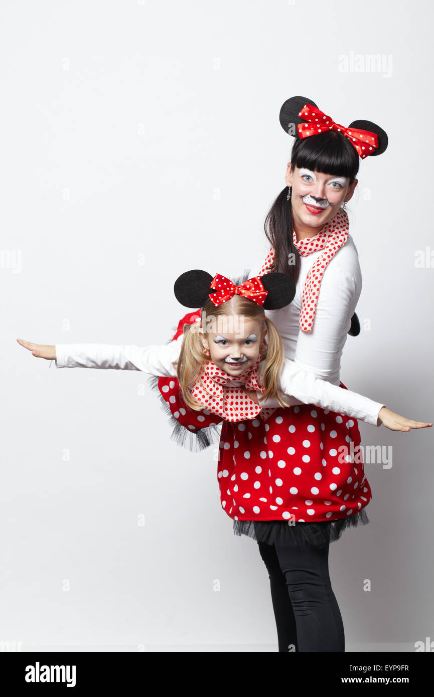 two girls with mouse masks Stock Photo - Alamy