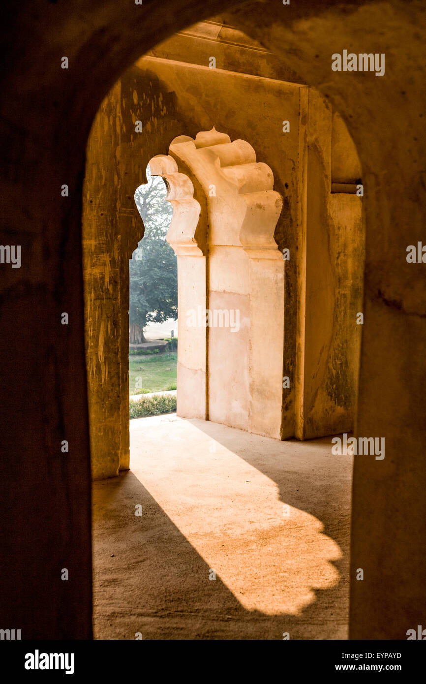 Mughal arches at the base of a cenotaph in Orchha, India. Numerous ...