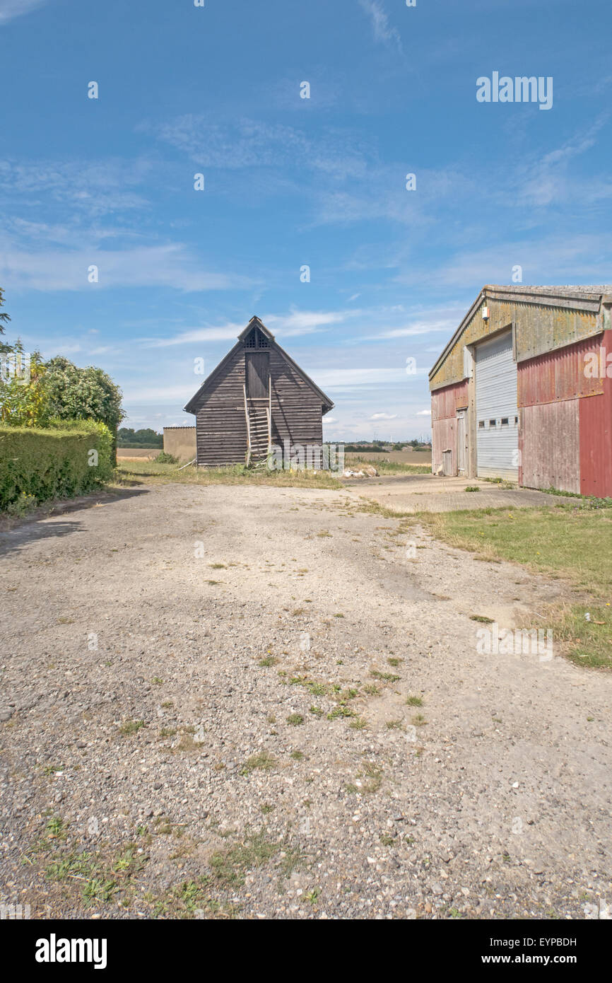 Barnyard with an old wooden shed Stock Photo - Alamy