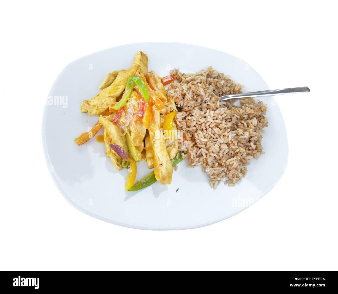 Curry chicken dinner with brown rice. Food on white plate Stock Photo ...